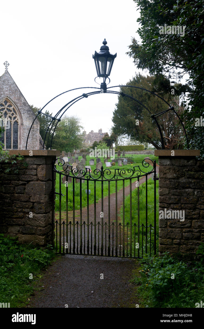 Church gate at St. Matthew`s Church, Coates, Gloucestershire, England ...