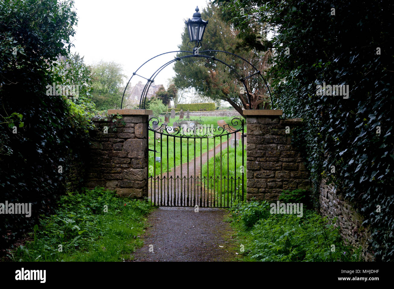 Church gate at St. Matthew`s Church, Coates, Gloucestershire, England ...