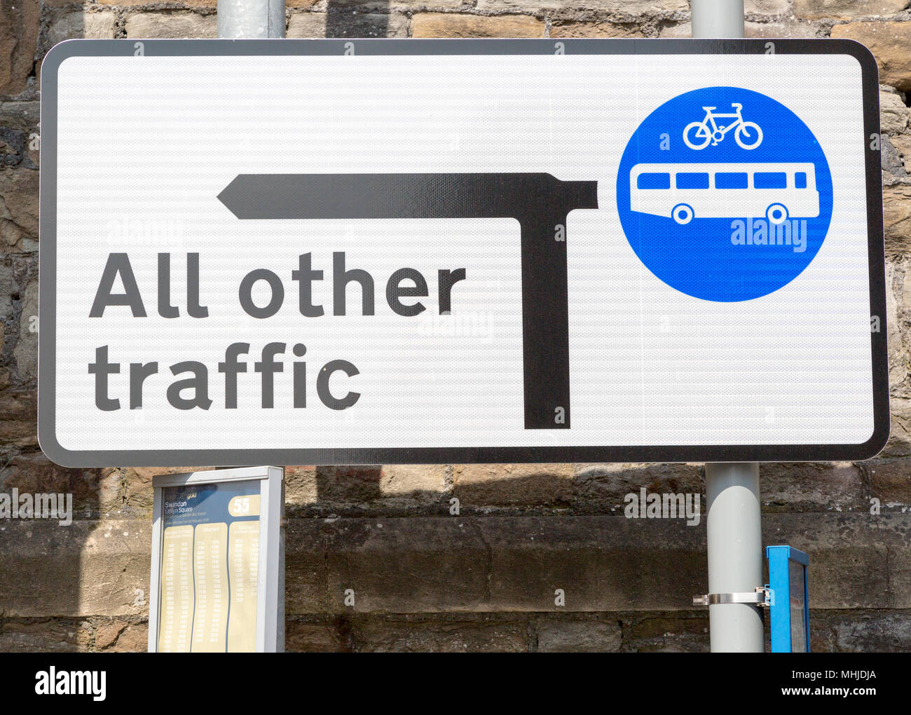 Direction sign for all other traffic except for buses and bicycles ...