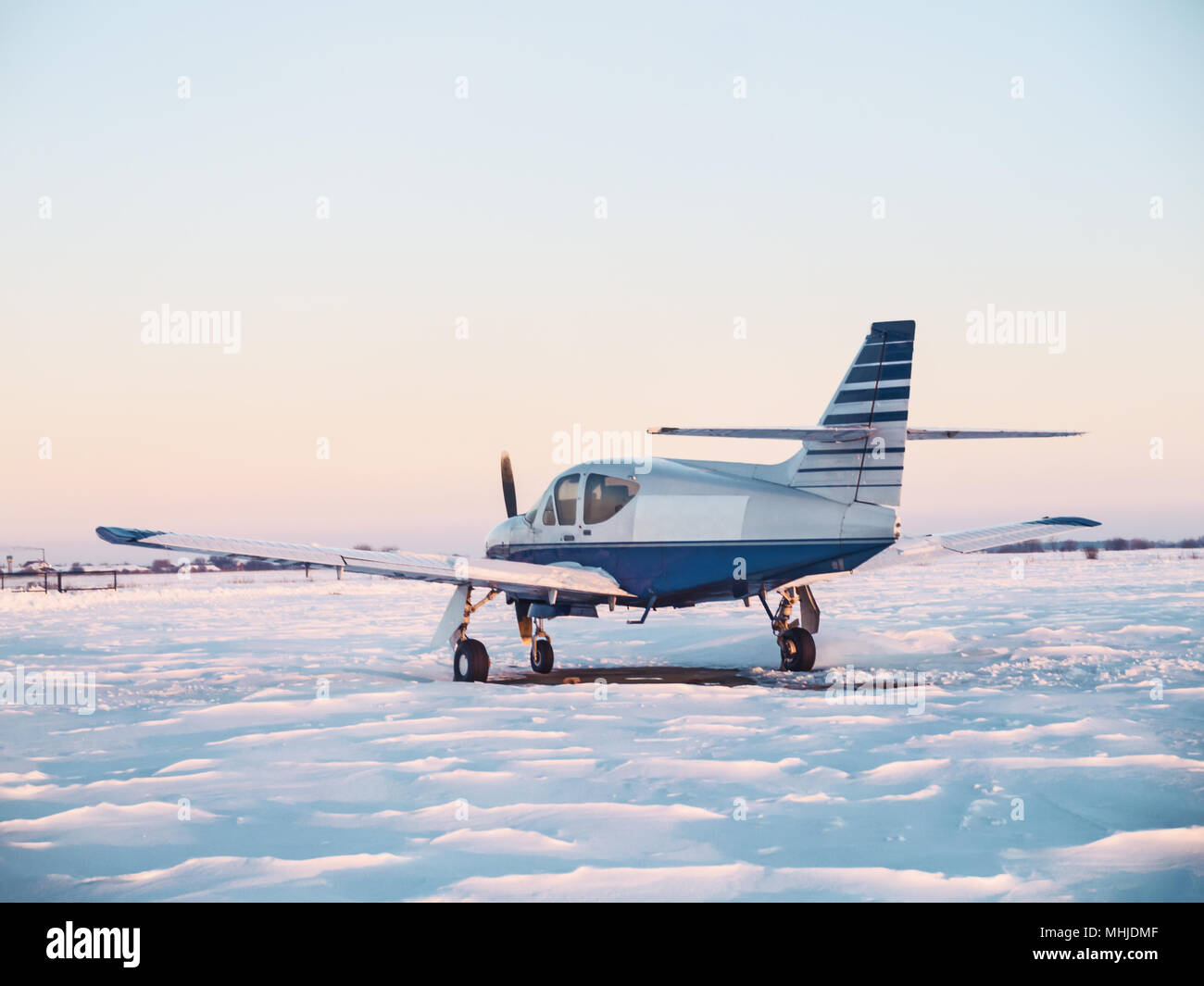 Airplanes parked at a small airport. Light aircraft on a private ...