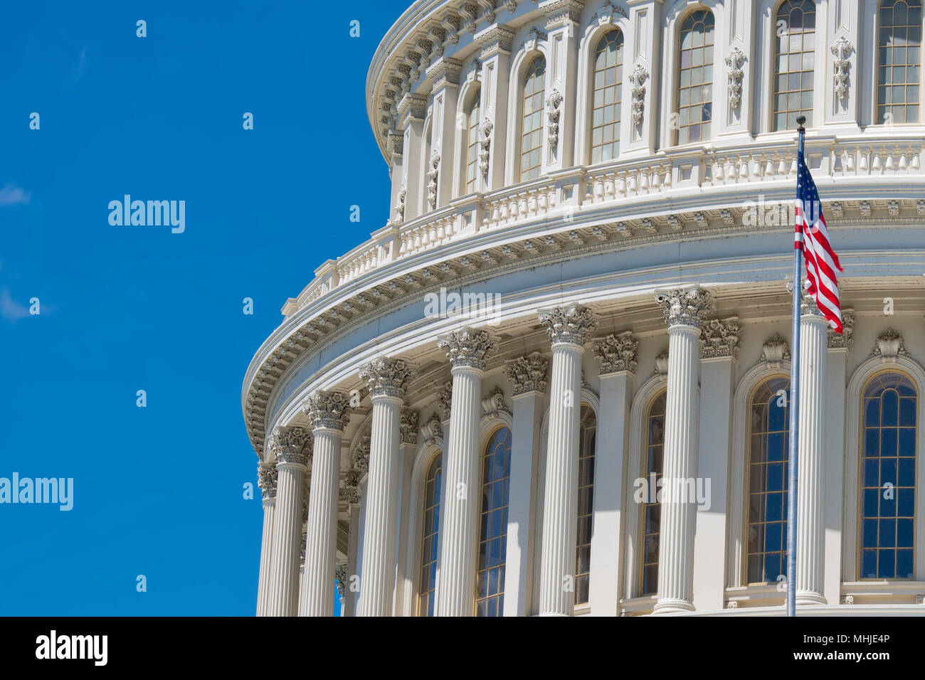 Washington DC Capitol detail with waving american flag Stock Photo - Alamy