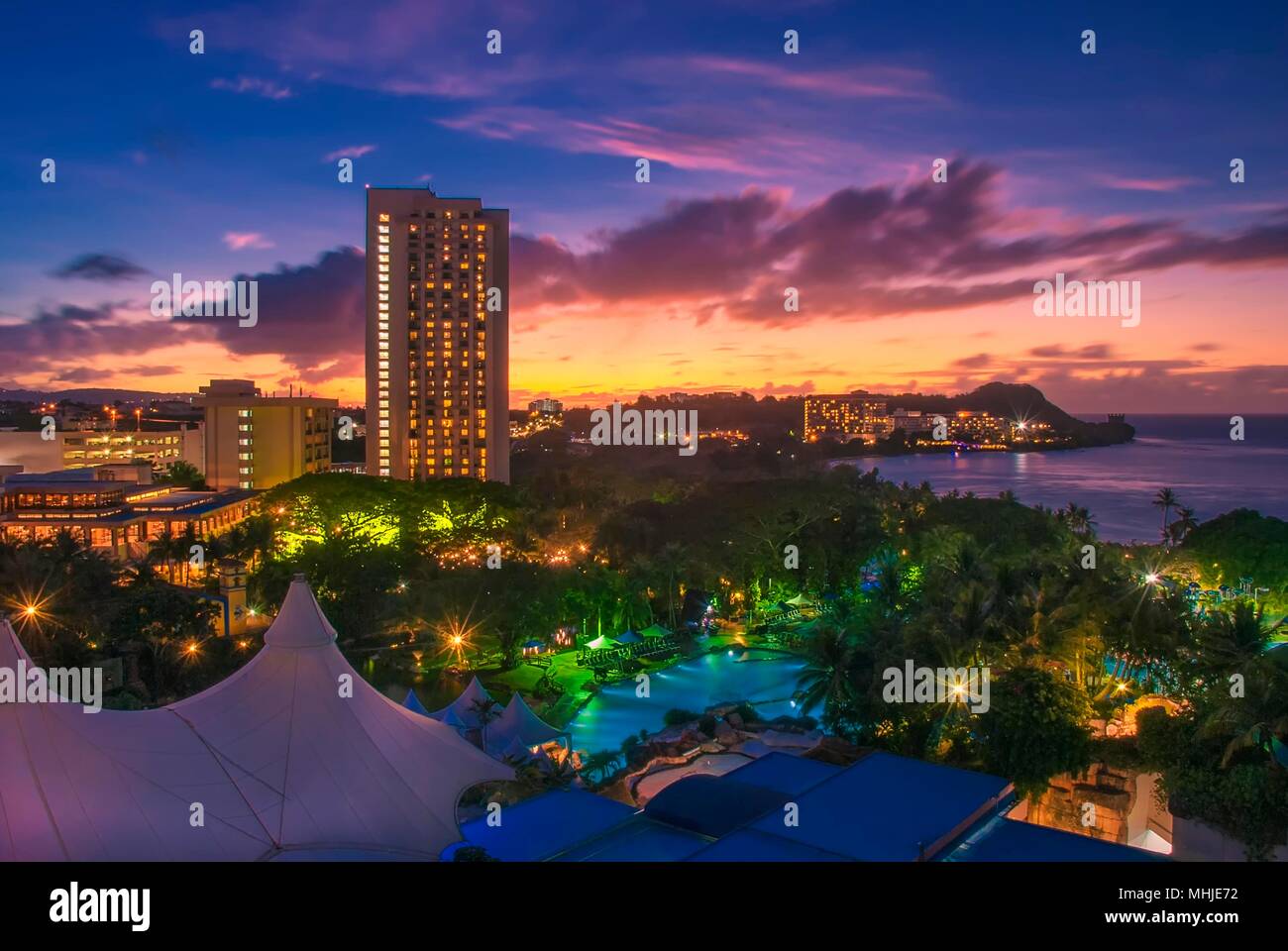 A colourful sunset over Guam Stock Photo - Alamy