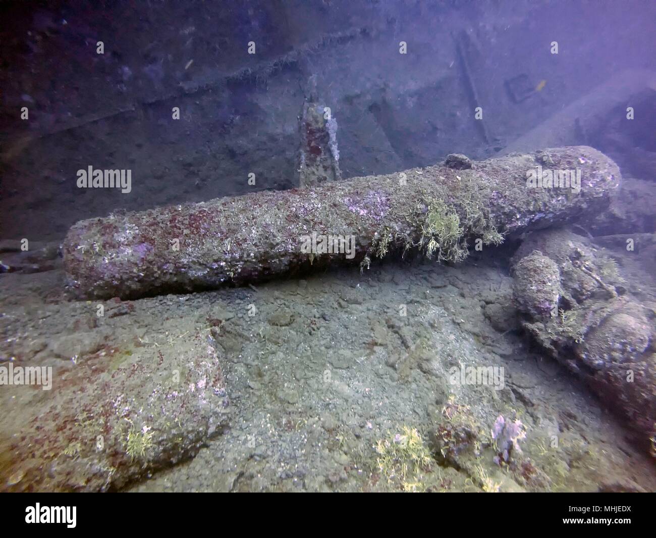 Torpedoes in the cargo hold of a ship sunk at Truk Lagoon during World ...