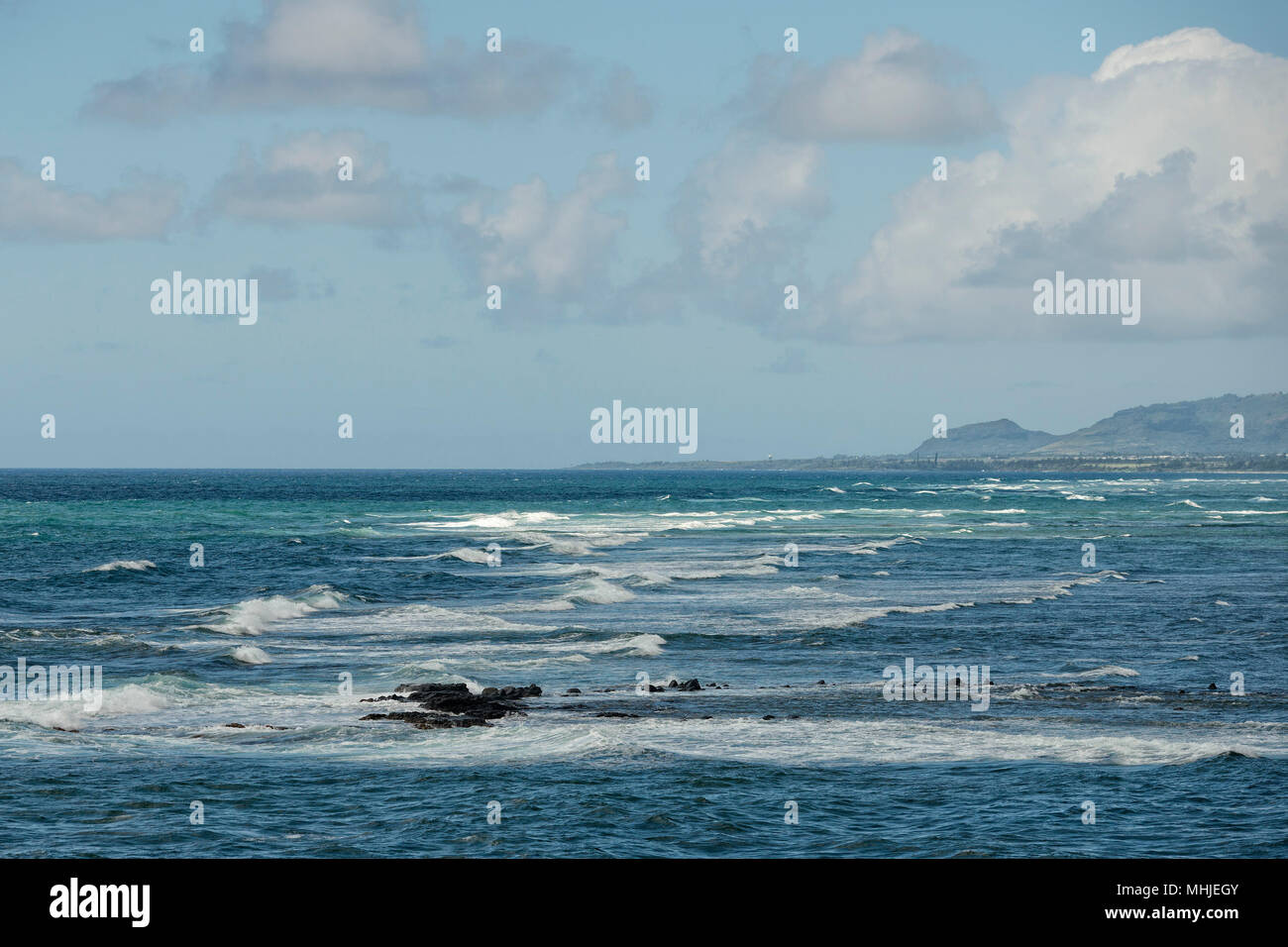 Waves on Hawaii beach panorama on windy day Stock Photo - Alamy