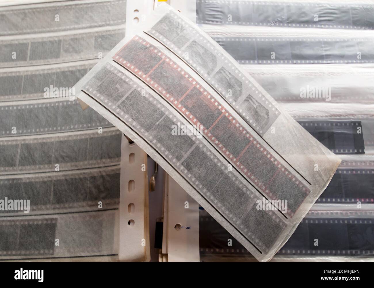 35 mm filmstrips in transparent paper storage close up Stock Photo - Alamy