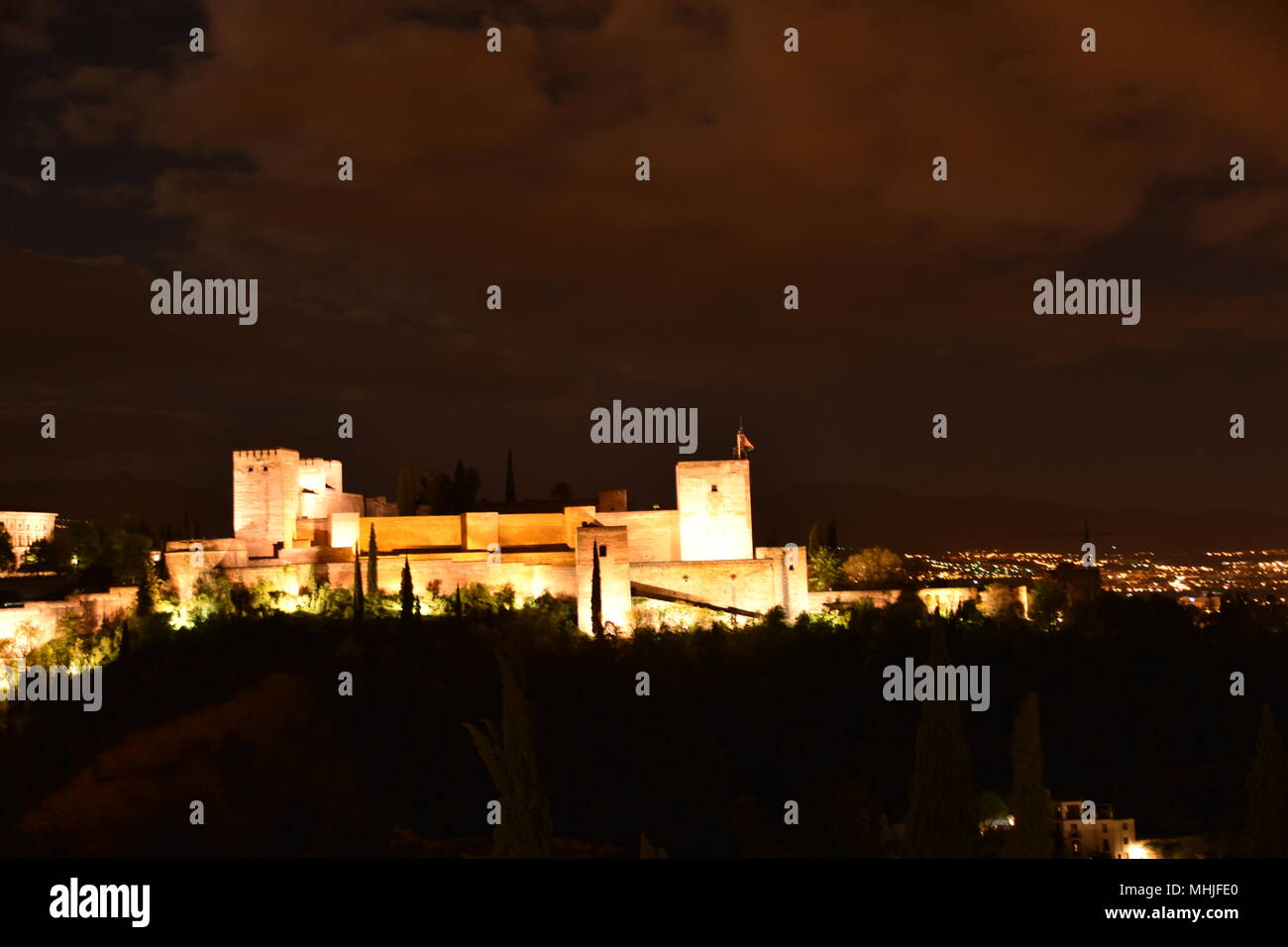 La Alhambra at night Stock Photo - Alamy