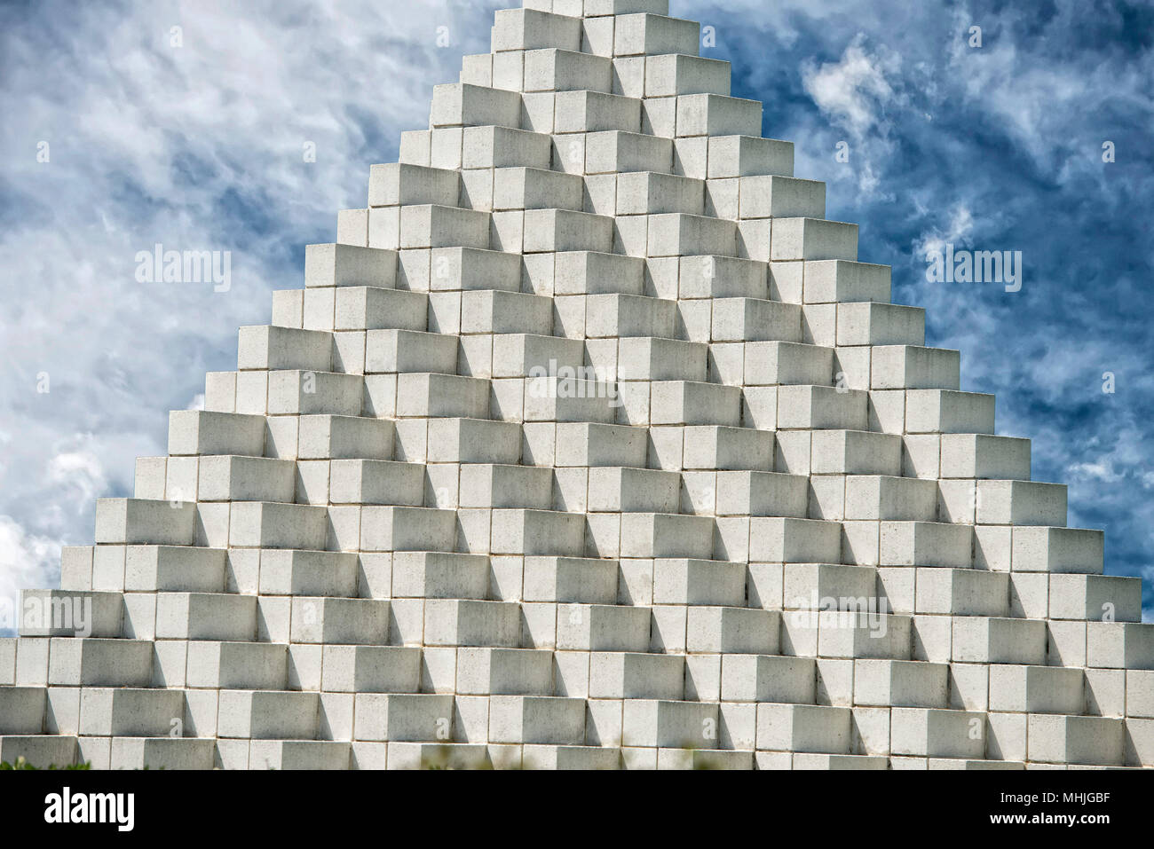 white cube pyramid on cloudy sky background Stock Photo - Alamy