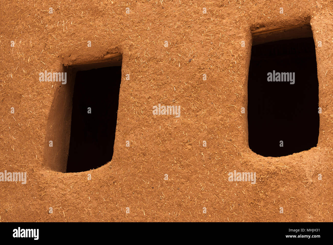 African Soil house windows Stock Photo - Alamy