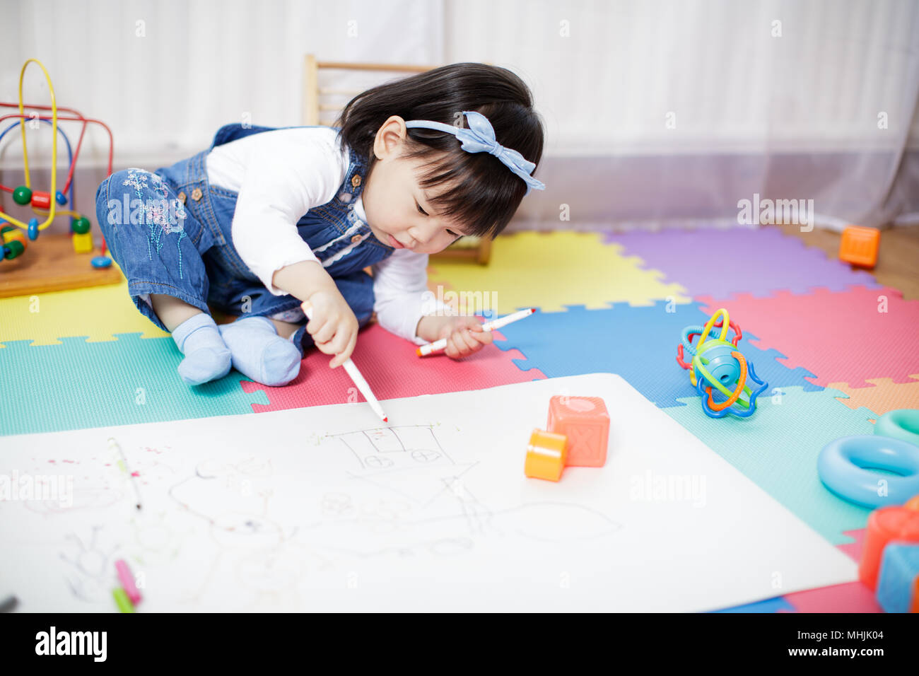 Asian wall paint kid hi-res stock photography and images - Alamy