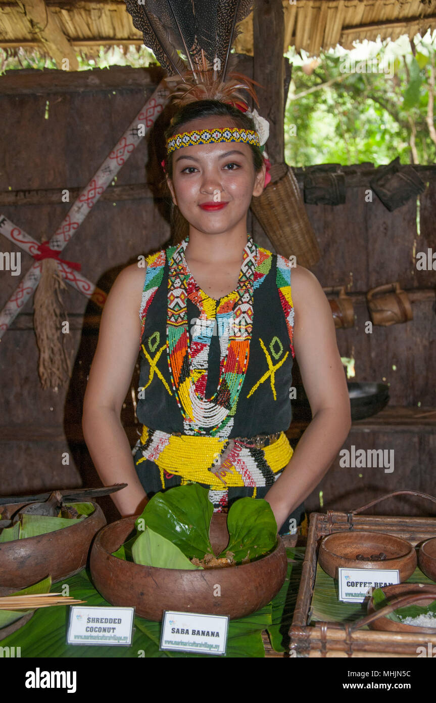 Offering food at the Murut Longhouse at the Mari Mari Cultural Village ...