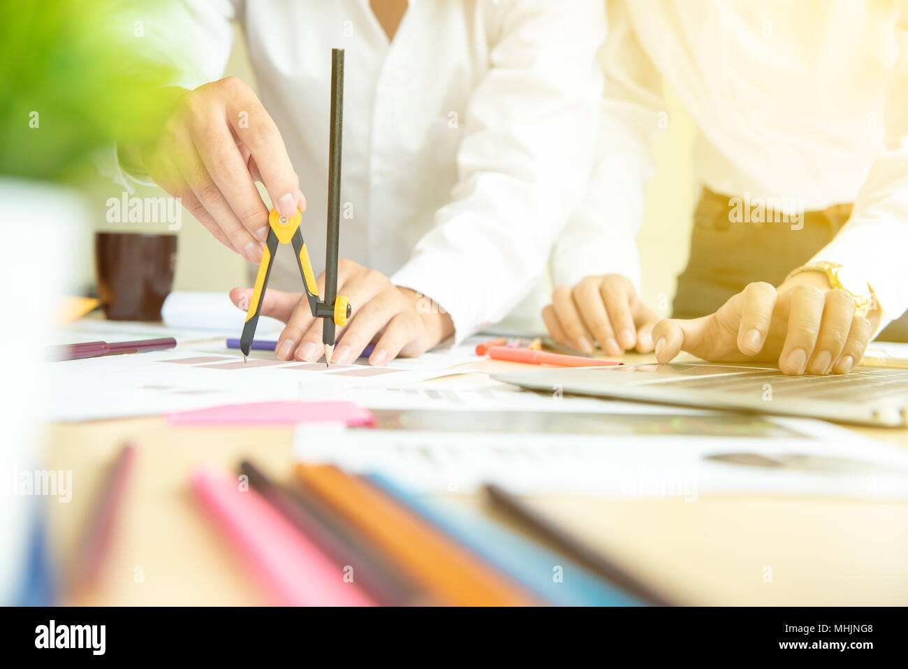 business group working check chart and paper data with laptop on desk ...