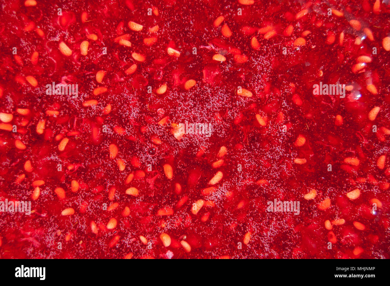 raspberry jam texture. Sweet texture. Crushed berries with sugar Stock ...