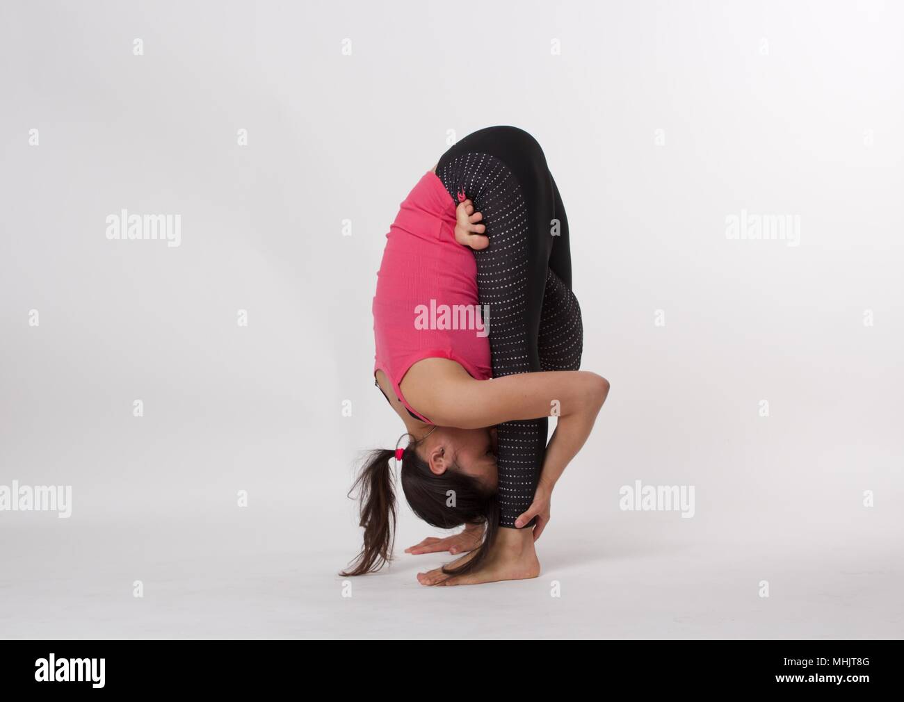 Contortion pose hi-res stock photography and images - Alamy