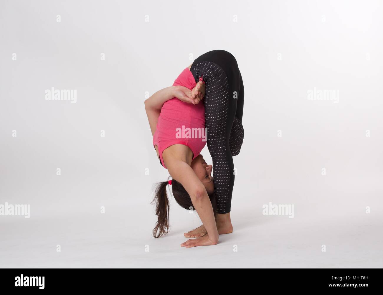 Contortion pose hi-res stock photography and images - Alamy