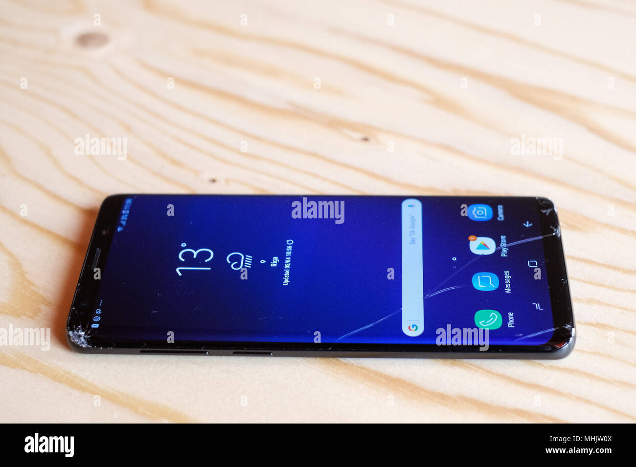 RIGA, APRIL 2018 - A smashed recently launched Samsung Galaxy S9 Plus ...