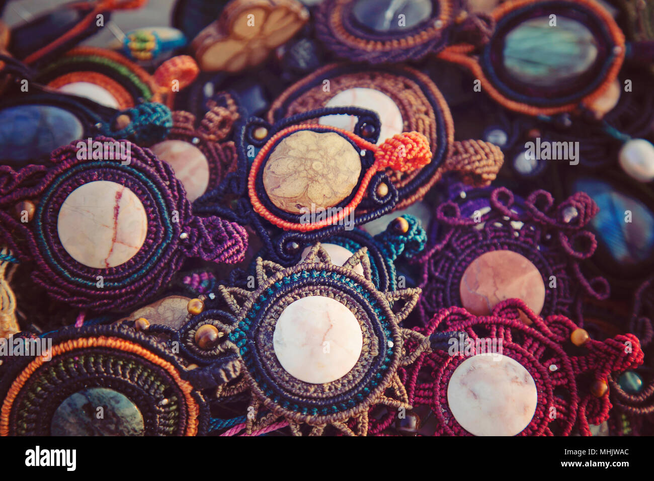 collection of natural stone handmade pendants Stock Photo - Alamy