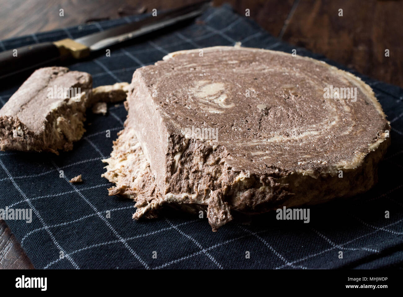 Turkish Chocolate Halva or Helva with Knife and Chocolate Pieces ...