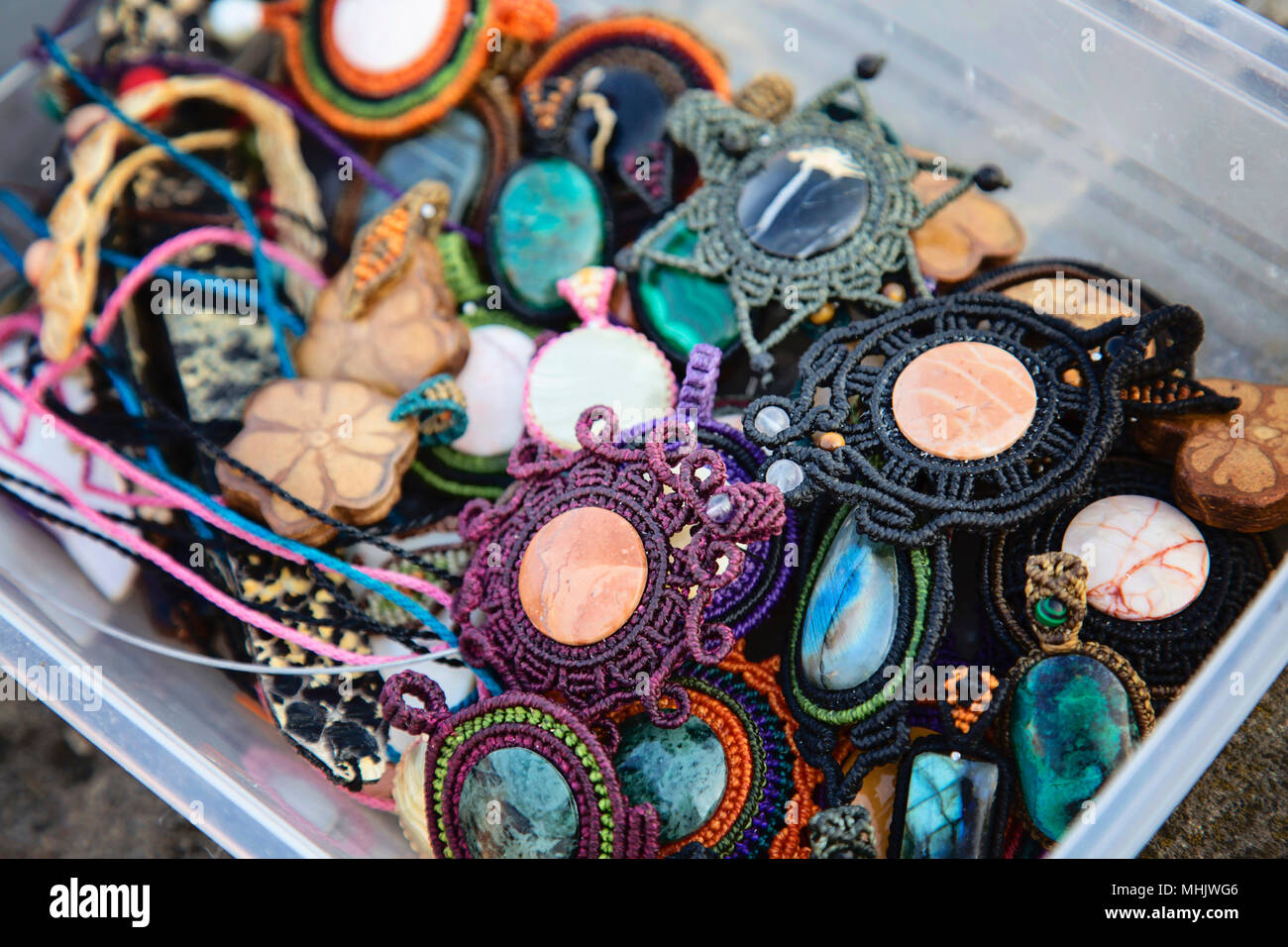collection of natural stone handmade pendants Stock Photo - Alamy