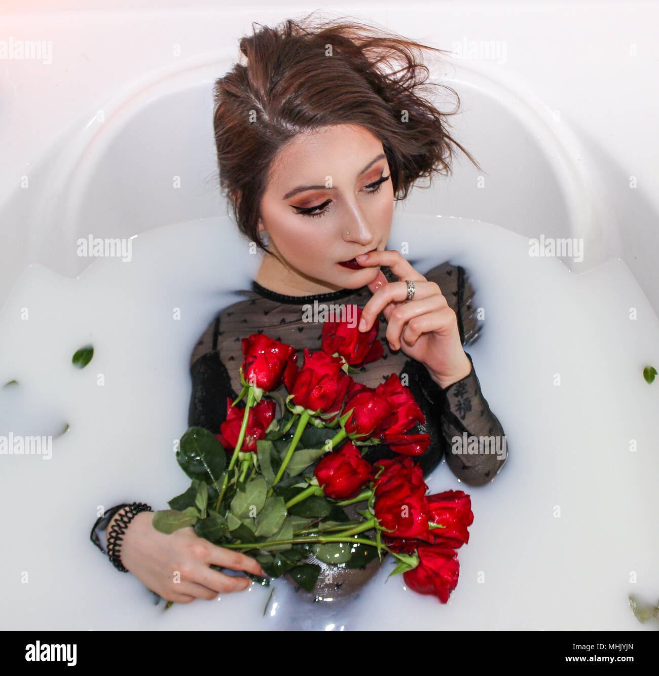 Model with roses hi-res stock photography and images - Alamy