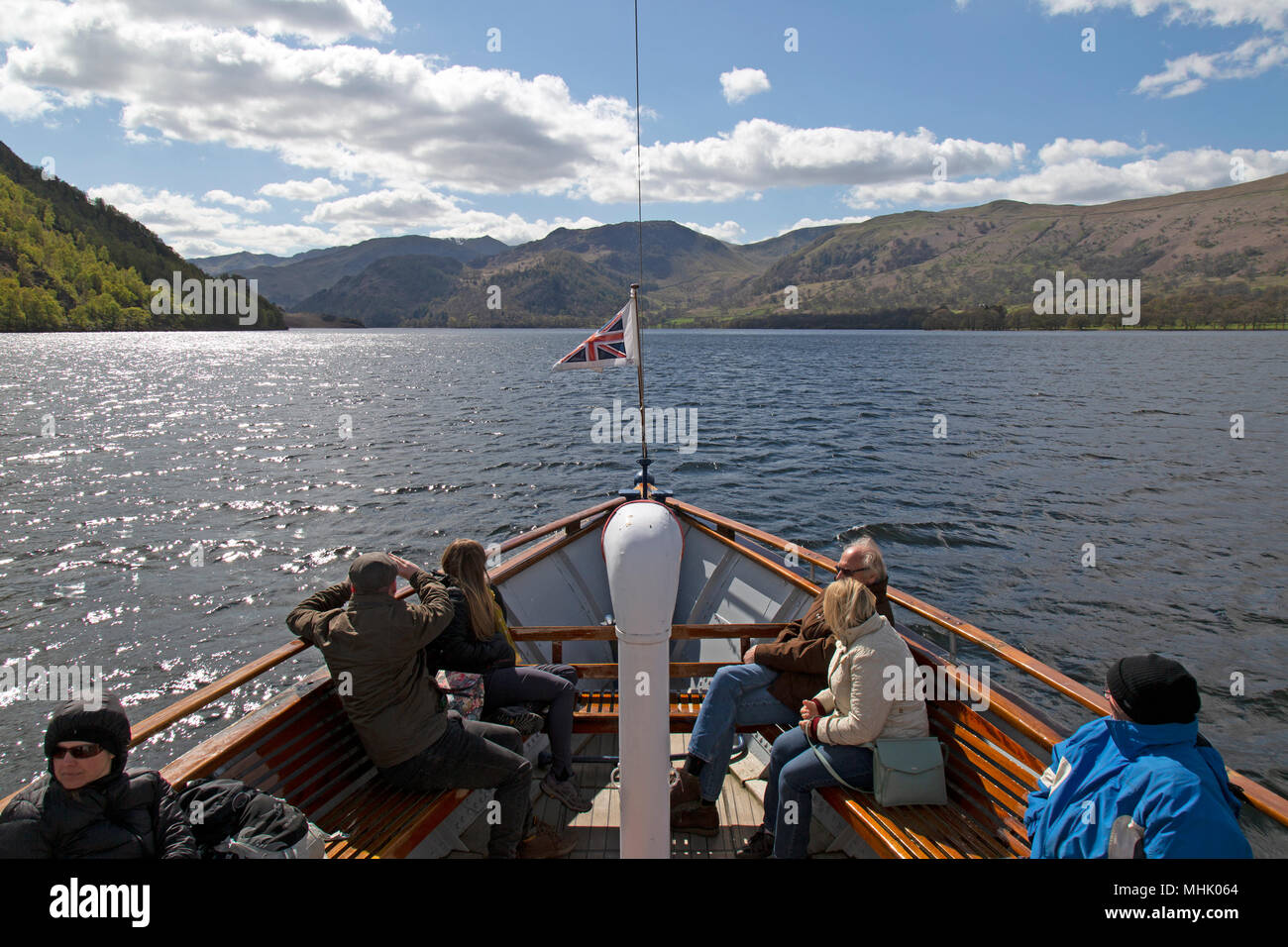Passengers enjoying the view from the front of the MV Raven, an ...