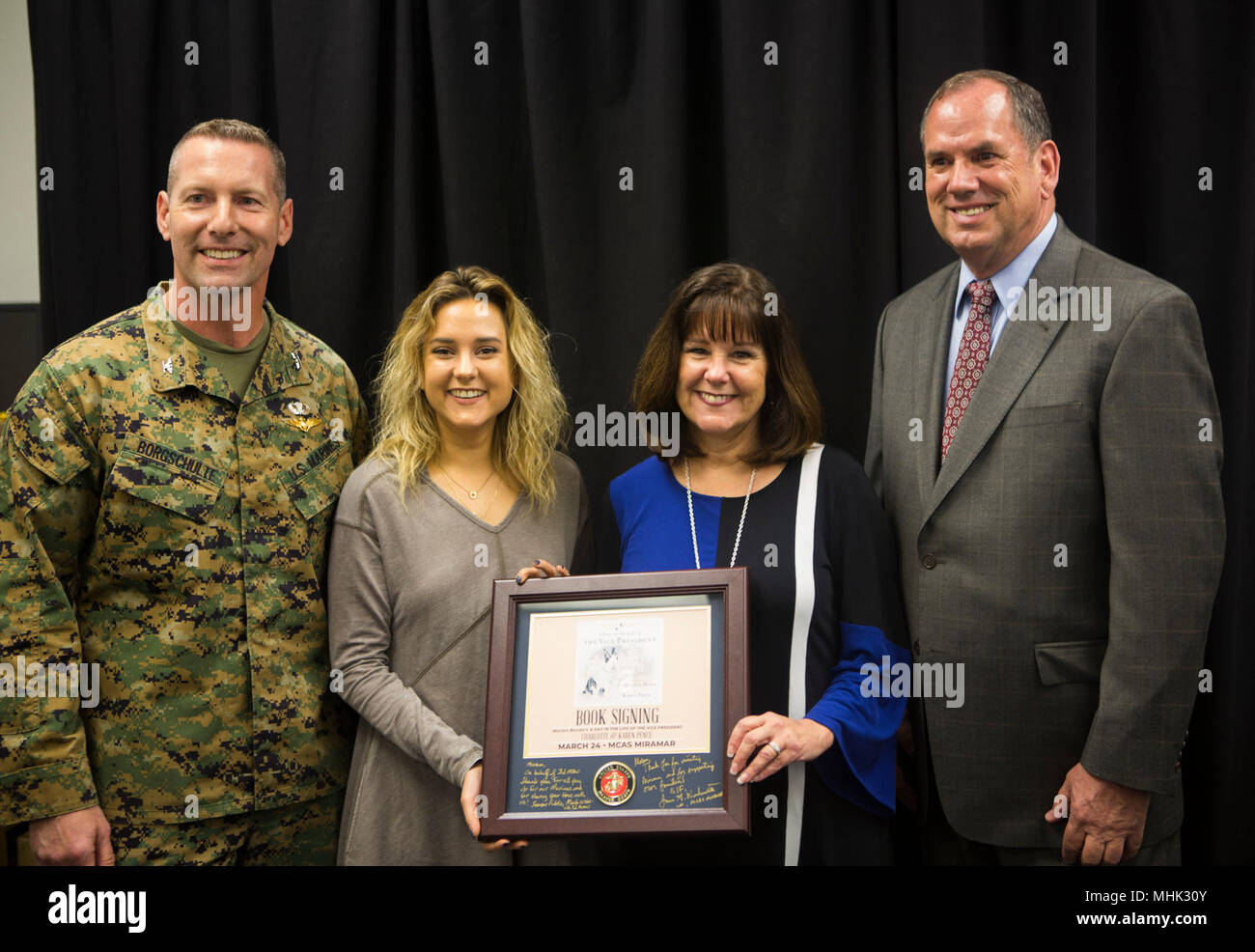 From left to right, Col. Michael Borgschulte, assistant wing commander ...