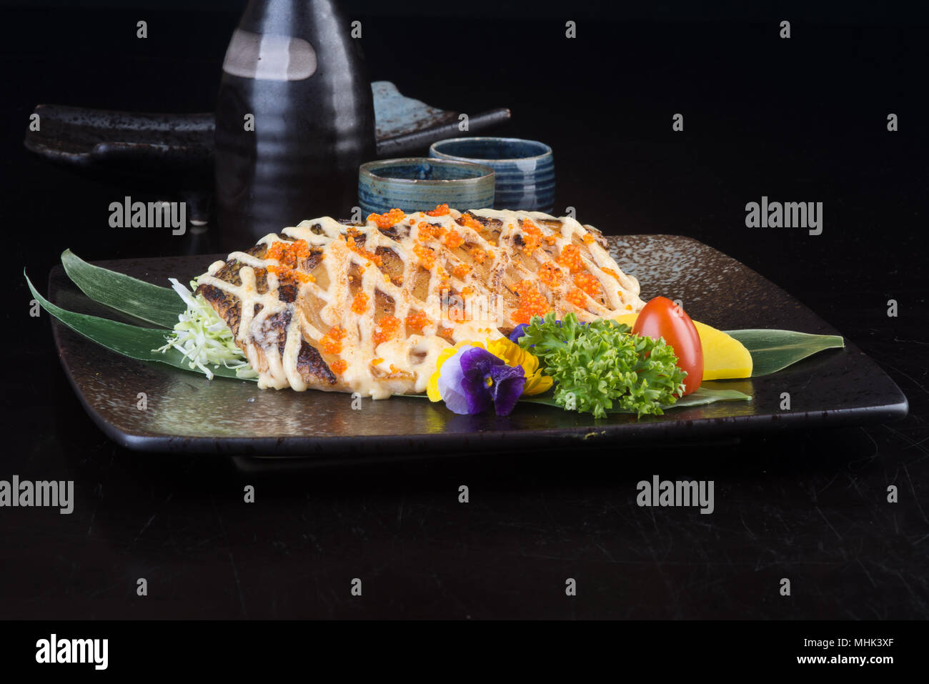 japanese cuisine. fried fish on background Stock Photo - Alamy