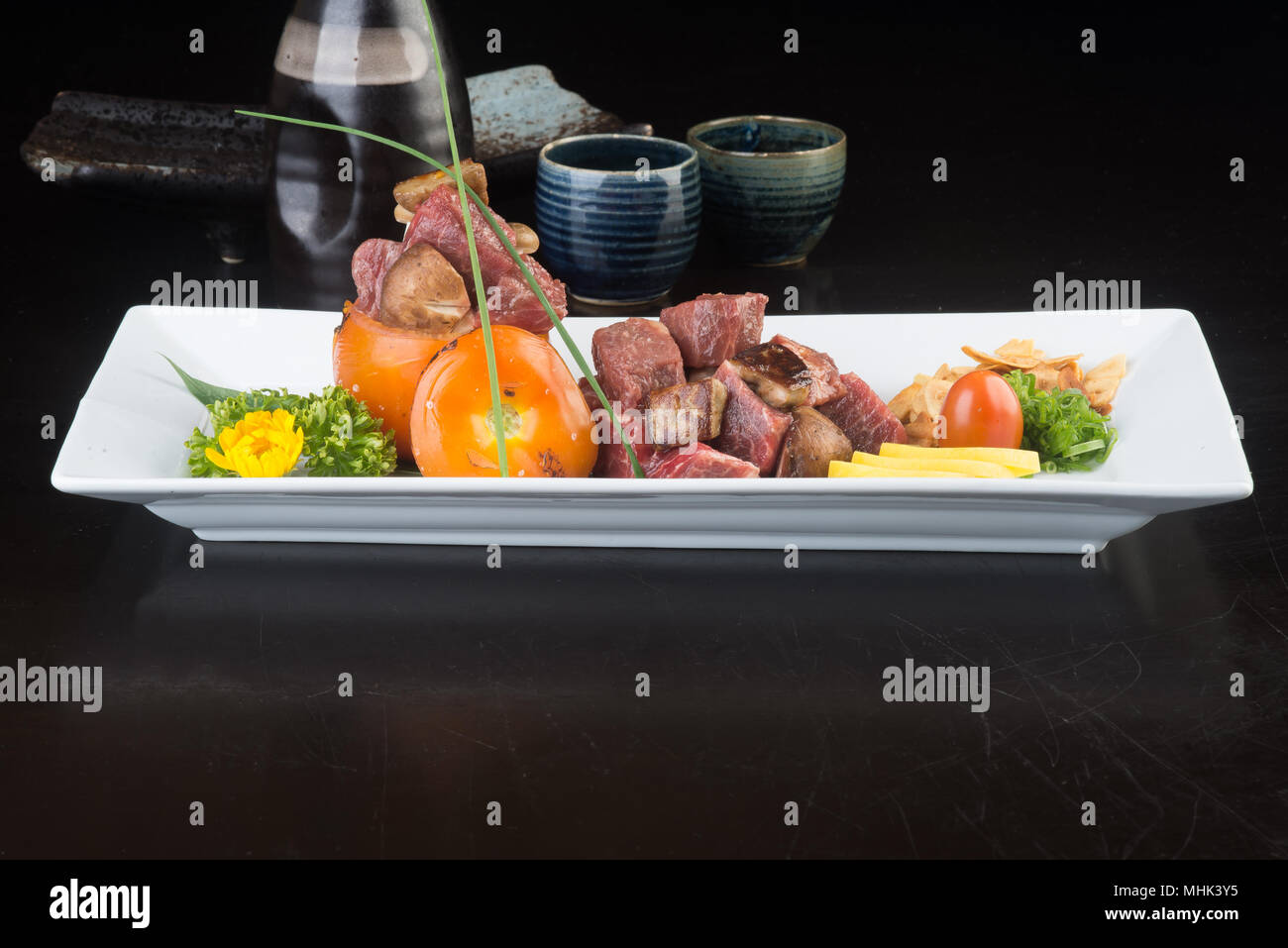 japanese cuisine. beef cube on background Stock Photo - Alamy