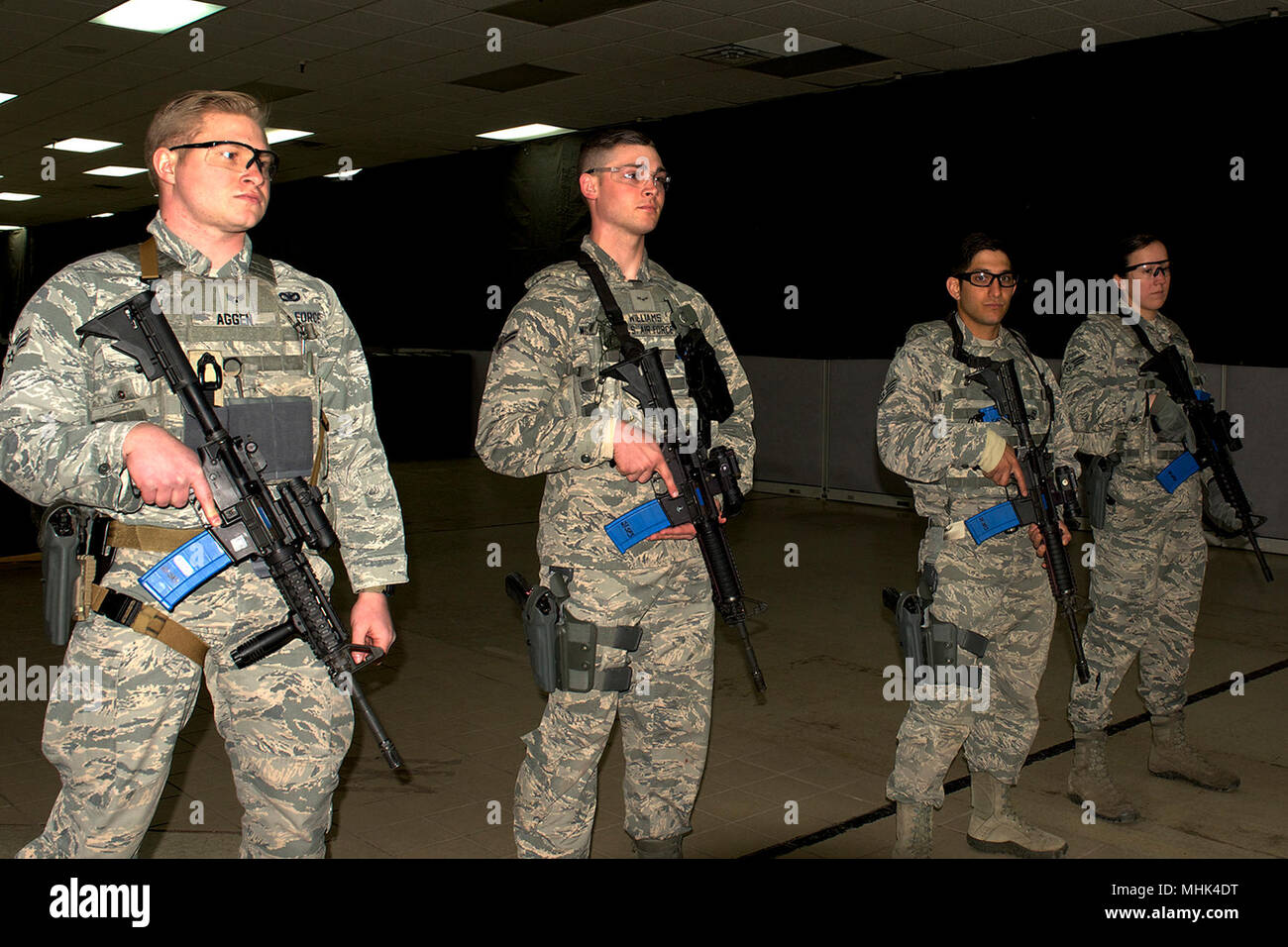 PETERSON AIR FORCE BASE, Colo. – Defenders prepare to give a demonstration at the 21st Security ...