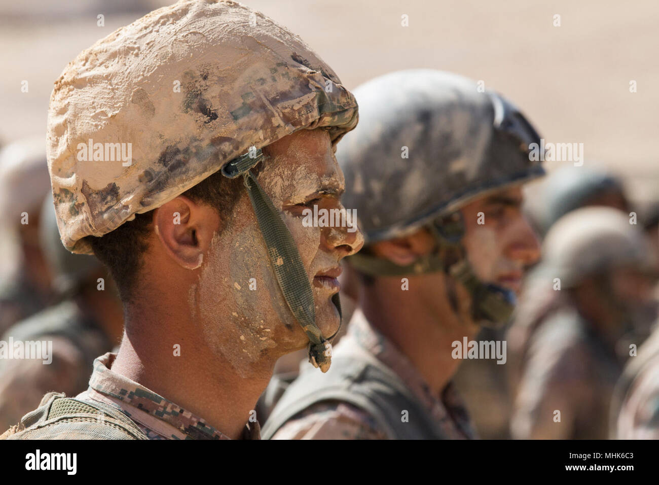 A Jordanian service member stands in formation during graduation of the ...