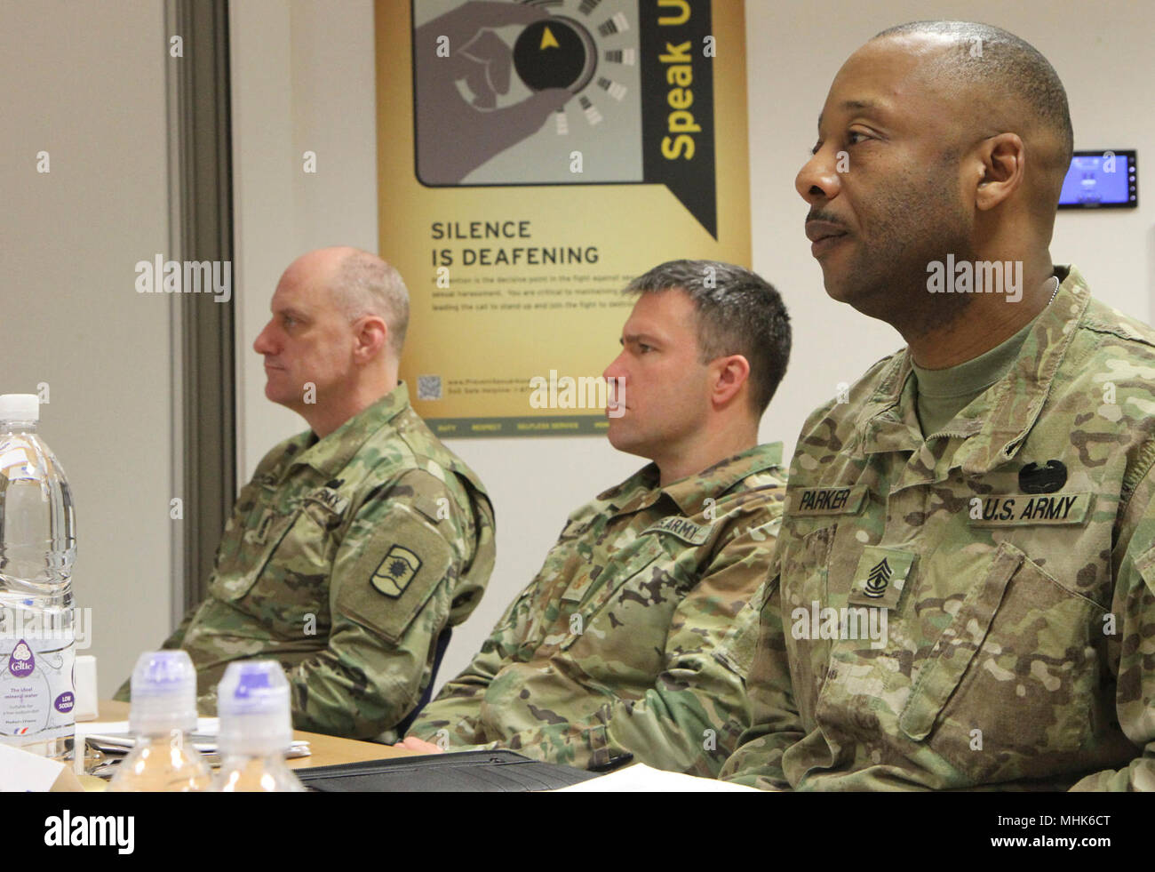 Soldiers from 361st Civil Affairs Brigade (361st CA BDE) listen to the ...