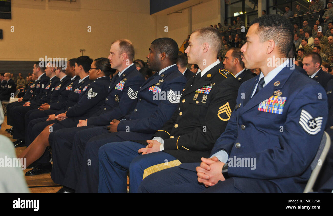 U.S. Army Staff Sgt. Jacob Rau, left, 21st Special Troops Battalion ...