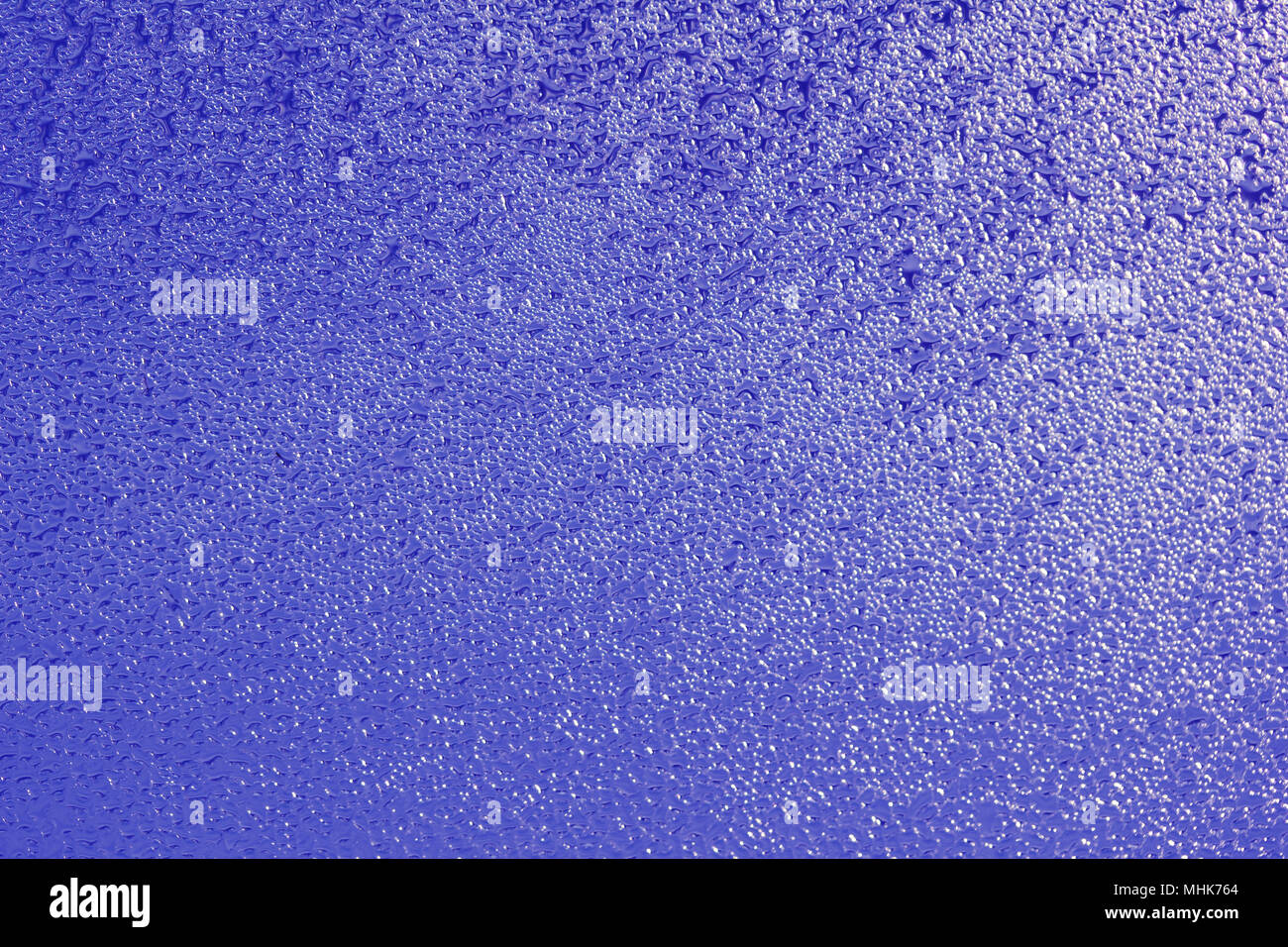 Macro view of moisture condensation on glass creating a beautiful ...