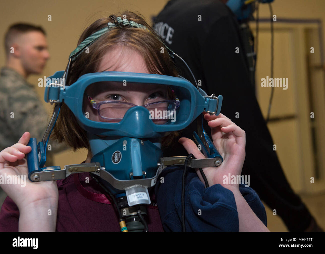 An Air Force Junior ROTC cadet from Timberview High School, Texas, dons ...