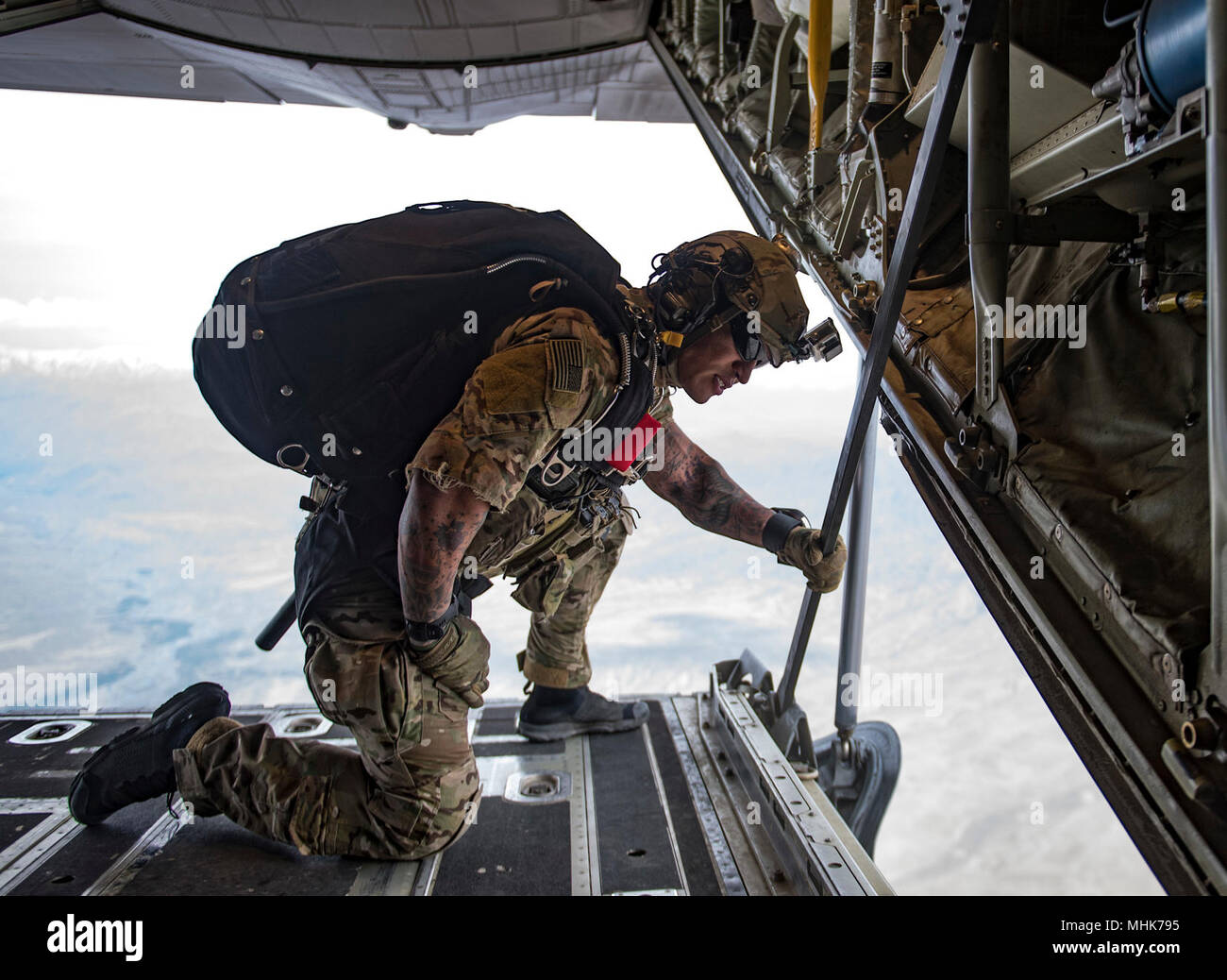 A U.S. Air Force pararescueman jumpmaster, assigned to the 83rd ...