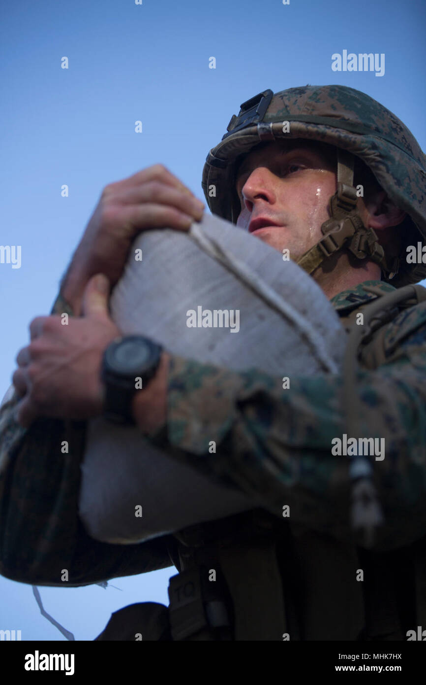 A U.S. Marine with 8th Marine Regiment, 2nd Marine Division executes ...
