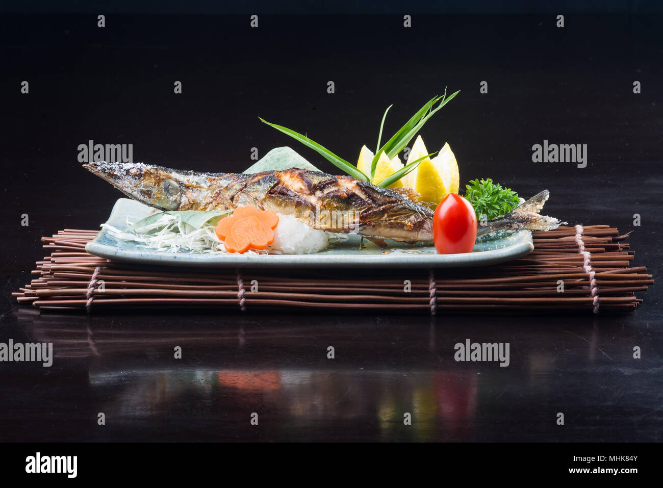 japanese cuisine. fried fish on background Stock Photo - Alamy