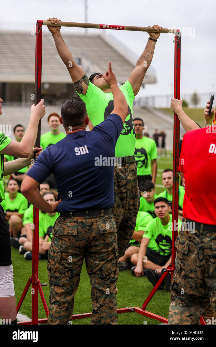 U.S. Marines and poolees with Recruiting Station Houston, conduct an ...