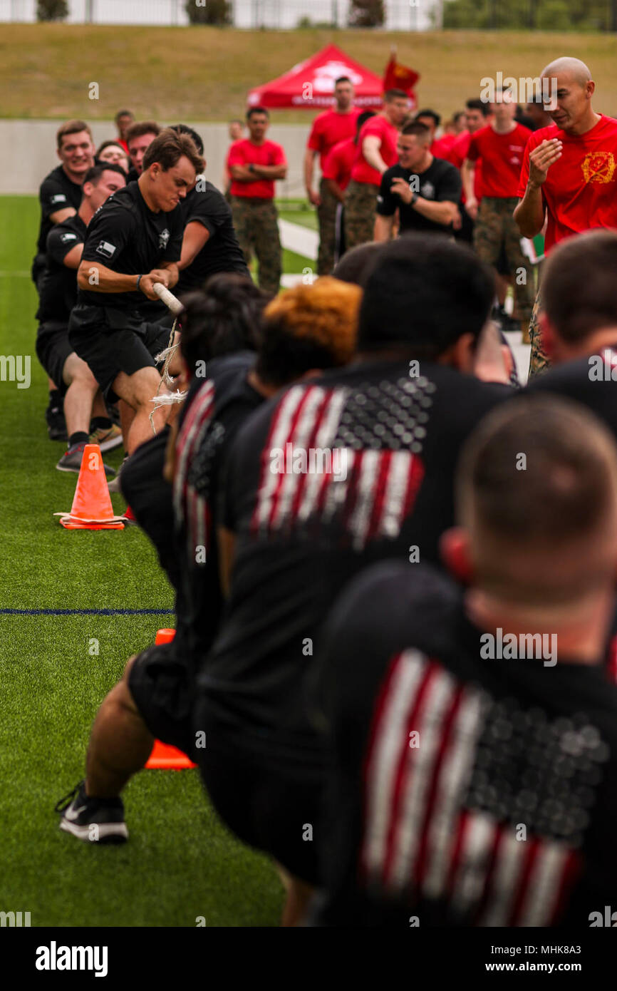 U.S. Marines and poolees with Recruiting Station Houston, conduct an ...
