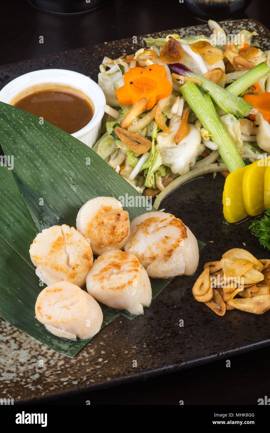 japanese cuisine. grilled shell fish on background Stock Photo - Alamy