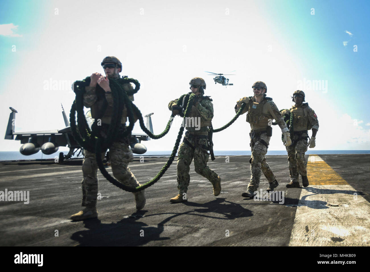 INDIAN OCEAN (March 27, 2018) Sailors, assigned to Explosive Ordnance ...
