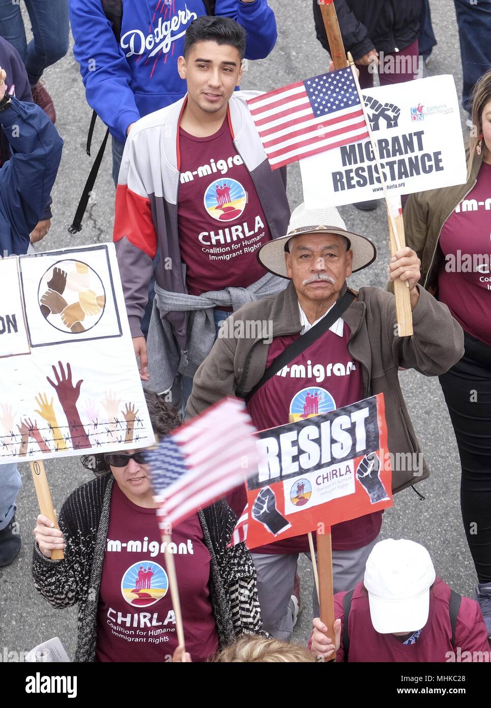 Los Angeles, California, USA. 1st May, 2018. Protesters carry signs ...