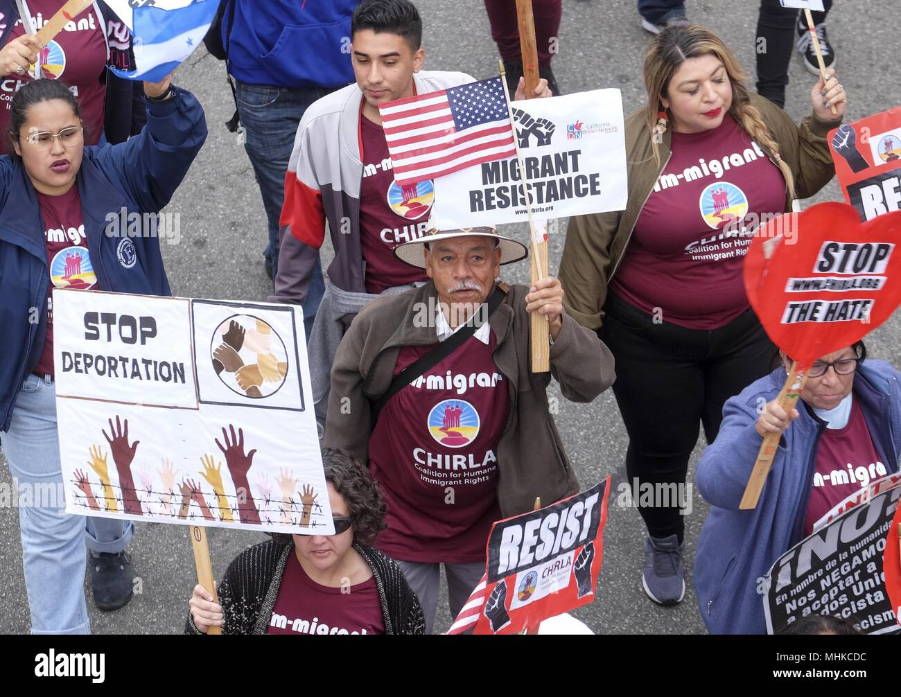 Los Angeles, California, USA. 1st May, 2018. Protesters carry signs ...