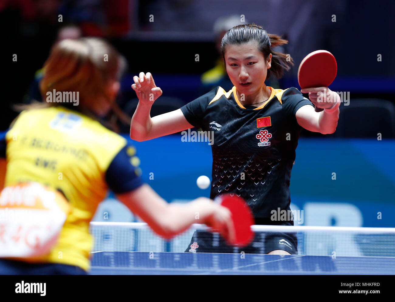 Halmstad, Sweden. 1st May, 2018. Ding Ning (R) of China returns the ...