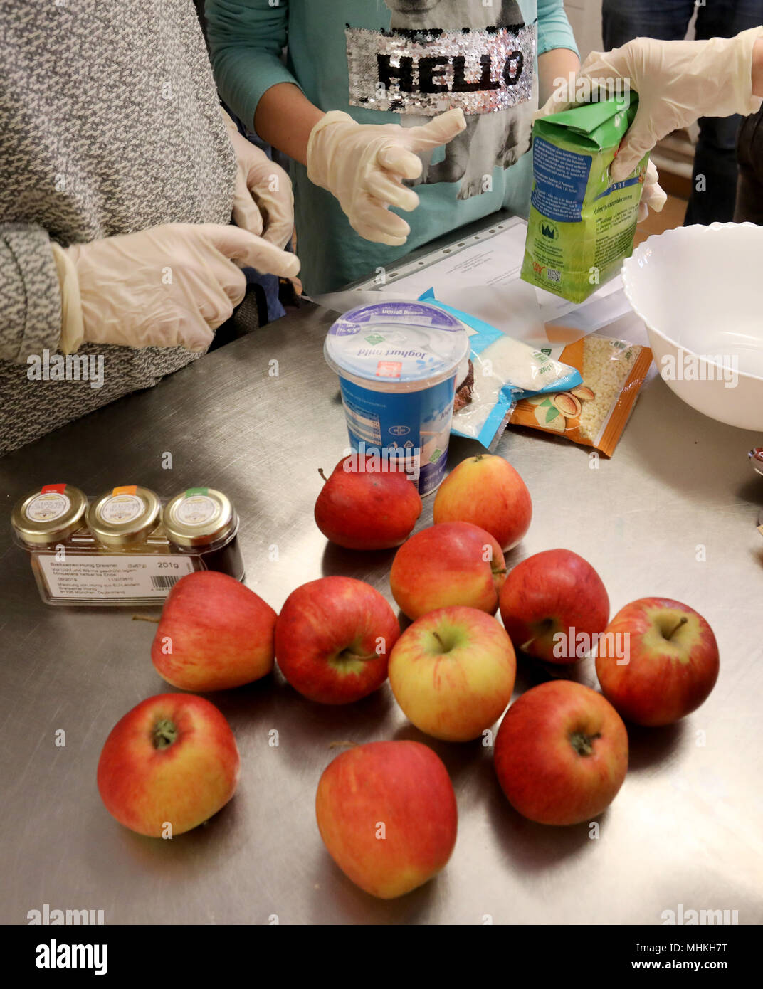 02 May 2018, Germany, Rostock: Pupils prepare a breakfast with the help ...