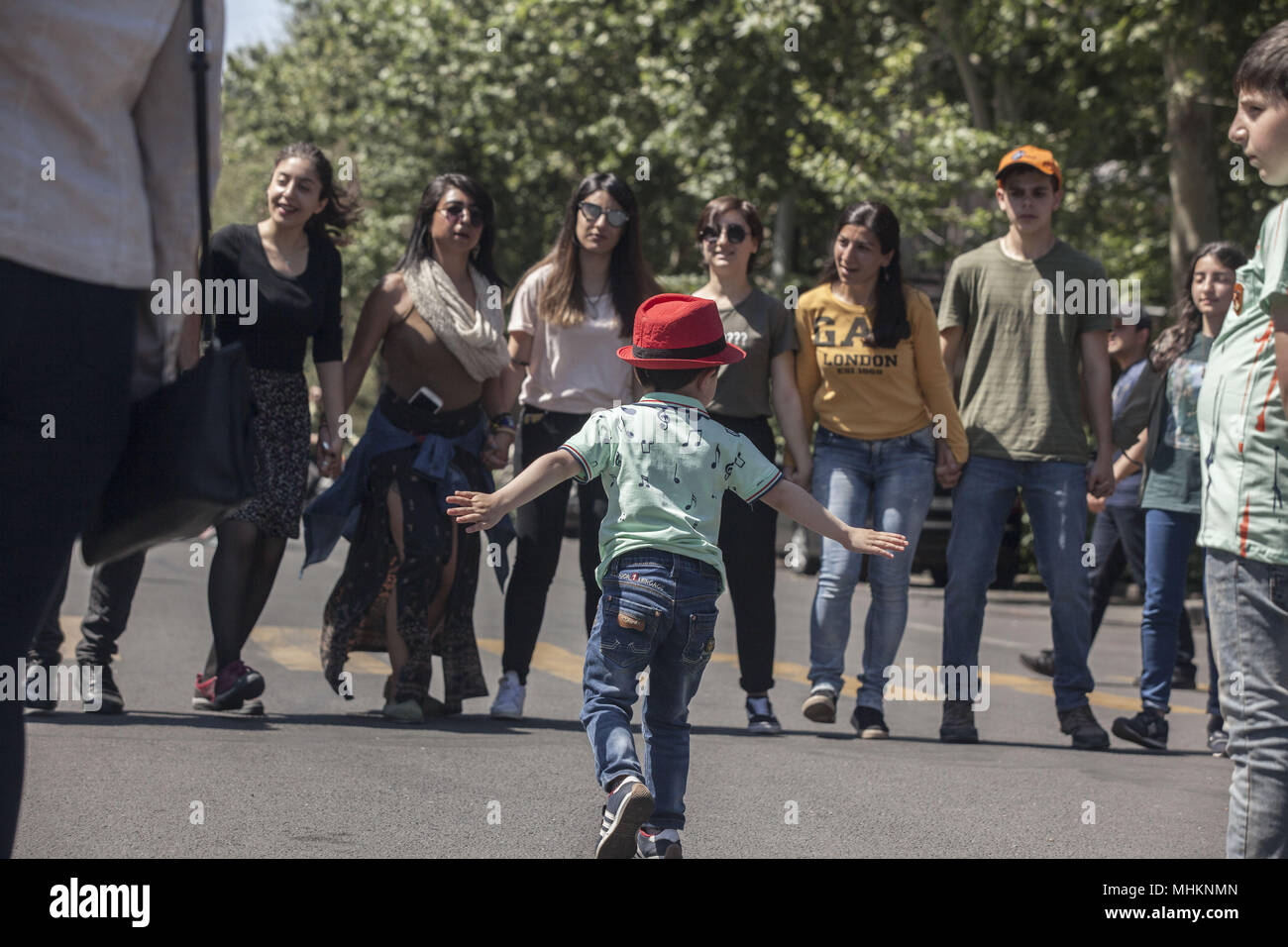 Yerevan, Armenia. 2nd May, 2018. A young boy dances in the middle of a ...