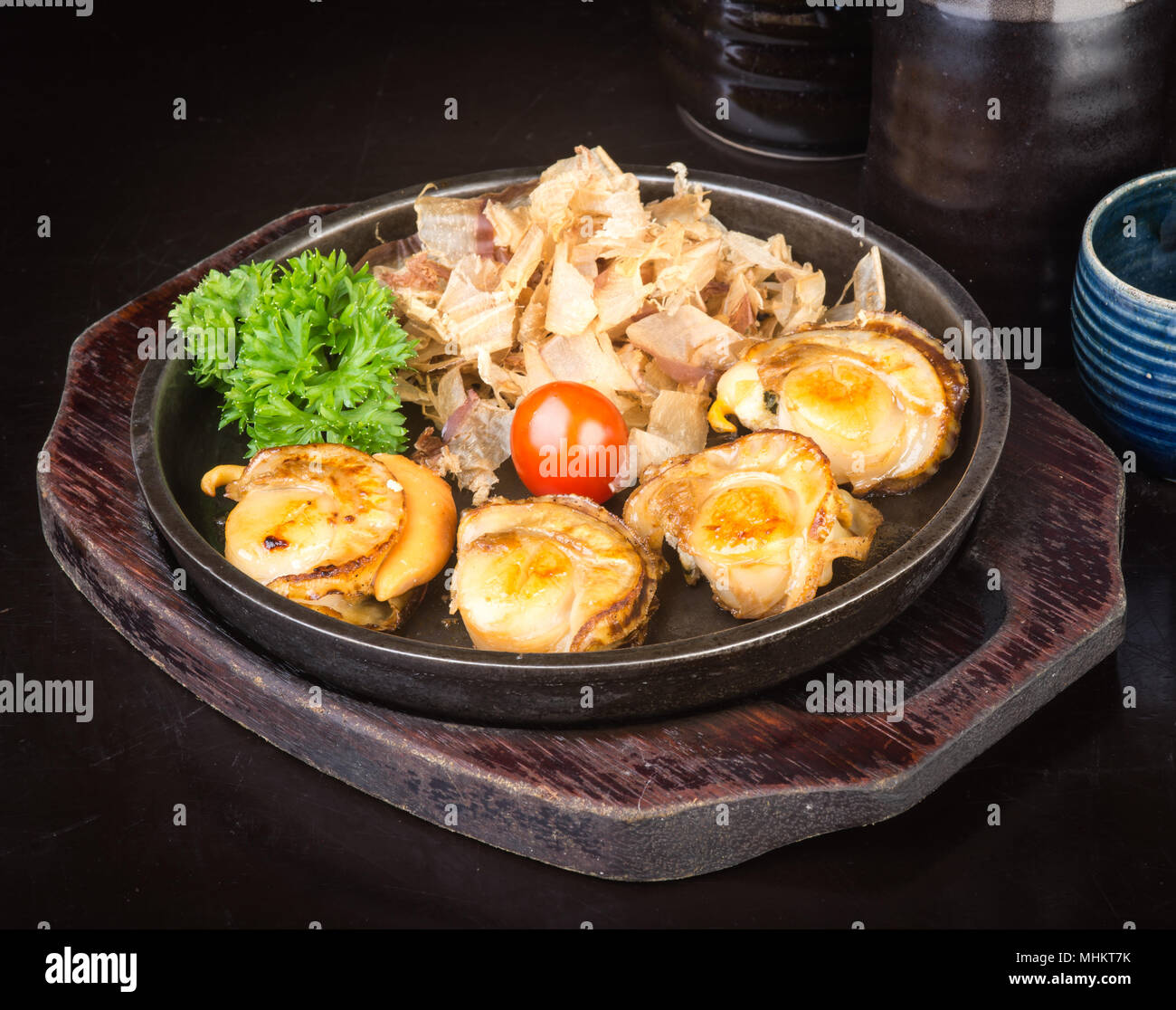 japanese cuisine. grilled shell fish on background Stock Photo - Alamy