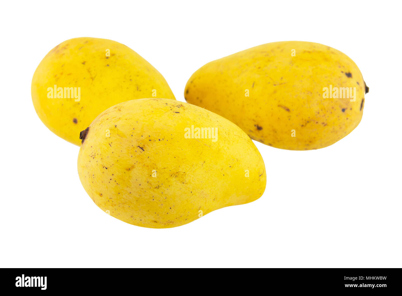Yellow mango isolated on a white background Stock Photo - Alamy