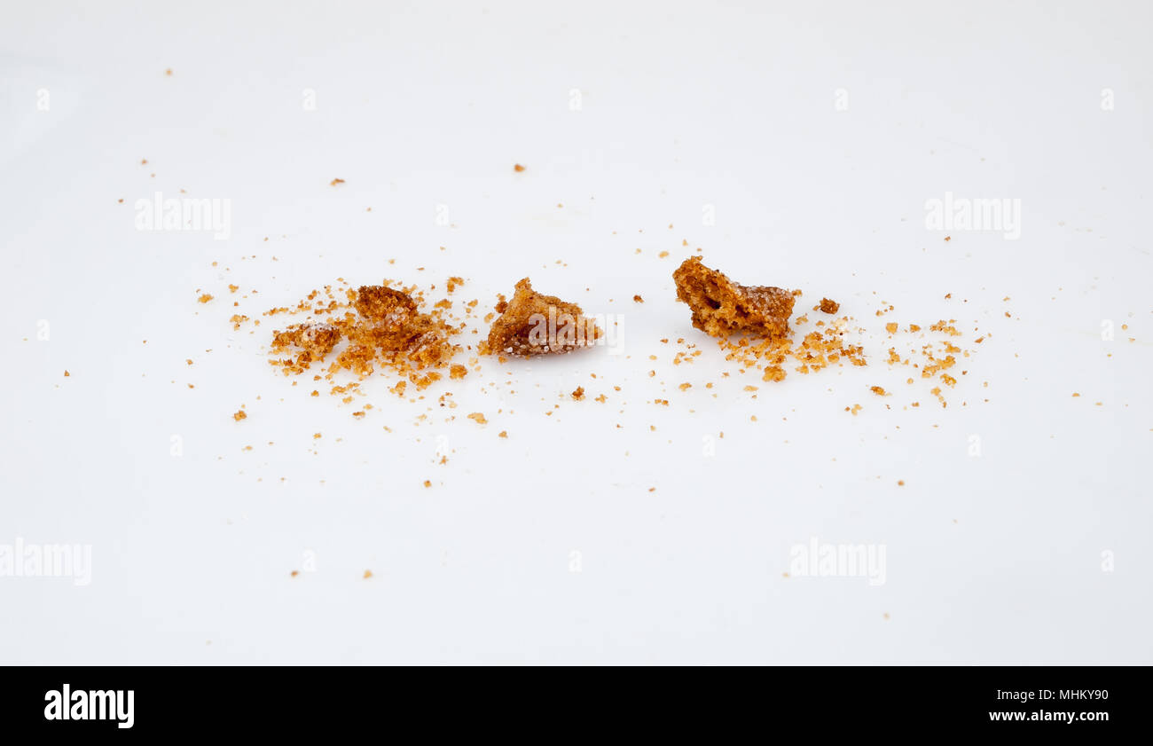 Scattered crumbs isolated on white background Stock Photo - Alamy