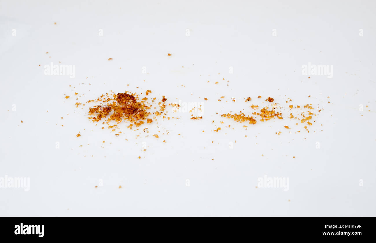Scattered crumbs isolated on white background Stock Photo - Alamy