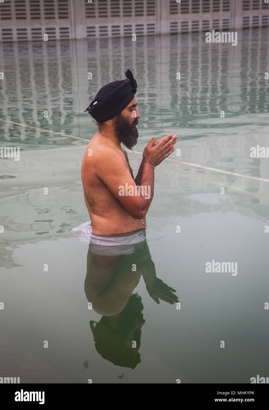 Sikh man bathing hi-res stock photography and images - Alamy